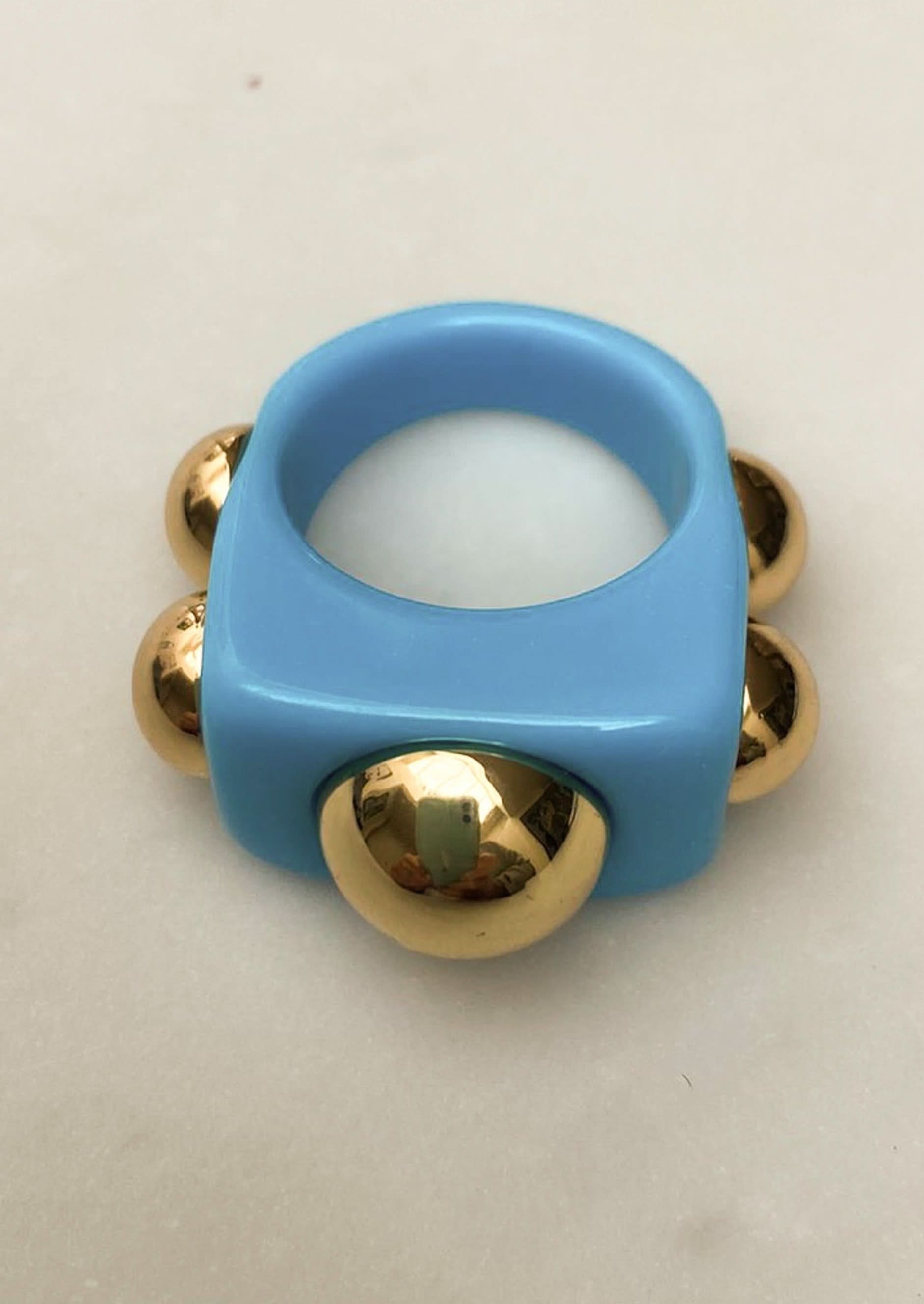 Chunky embellished stackable plastic resin rings in bright, fun colours ...